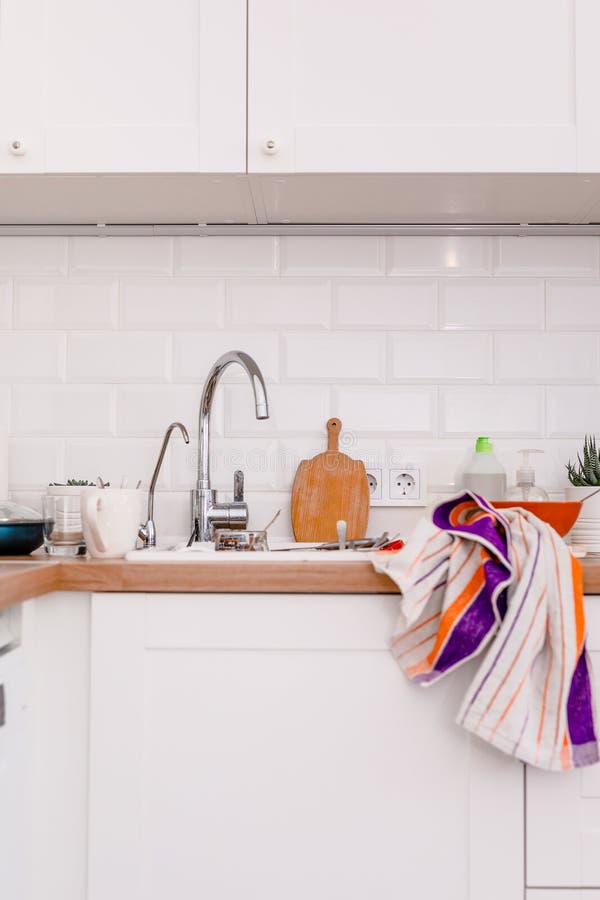 Clutter, Dirty Dishes by the Sink in the White Kitchen Stock Photo ...