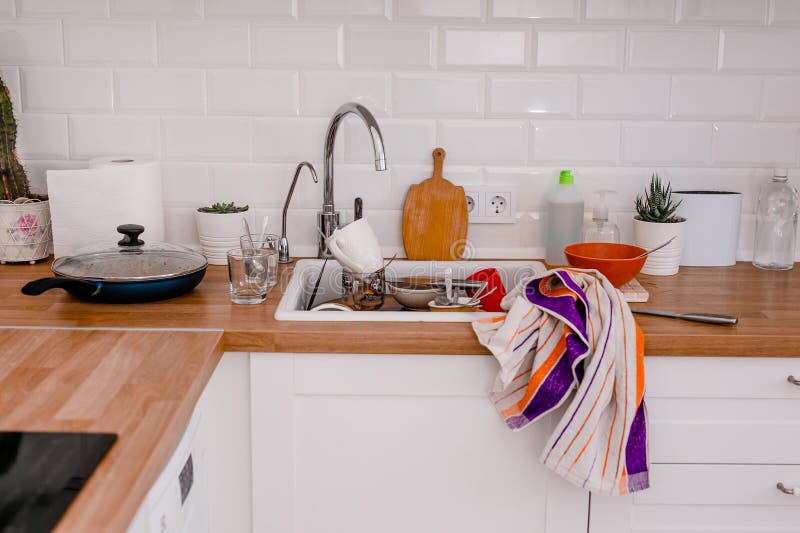 Clutter, Dirty Dishes by the Sink in the White Kitchen Stock Image ...