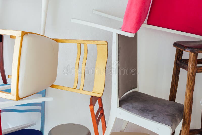 Many Different Chairs Stand in the White Room Stock Photo - Image of ...