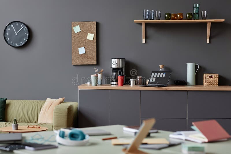 Cluttered Office Space in Neutral Grey with Focus on Coffee Station ...