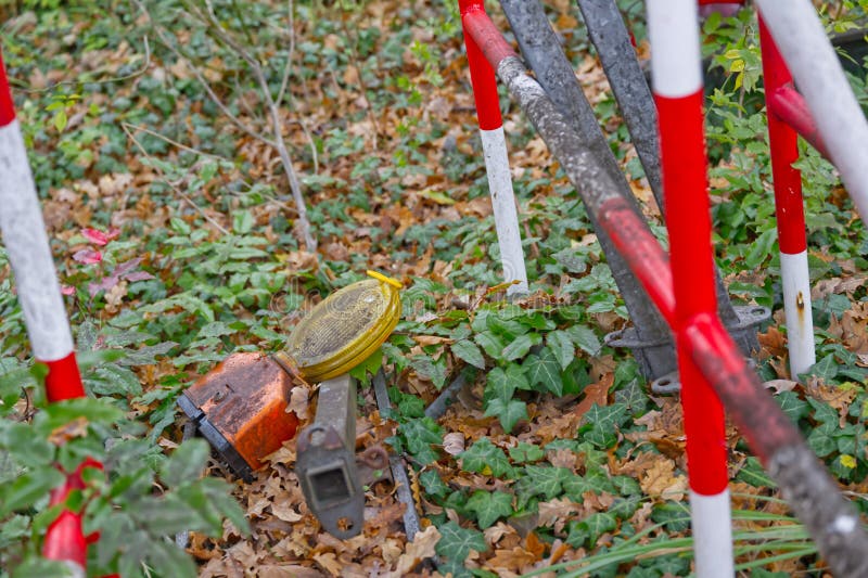 Cluttered Outdoor Scene with Construction Barriers and Leaves Stock ...