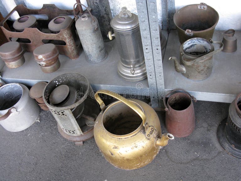 A Cluttered Shelf Holding an Array of Vintage Kitchenware, Including a ...