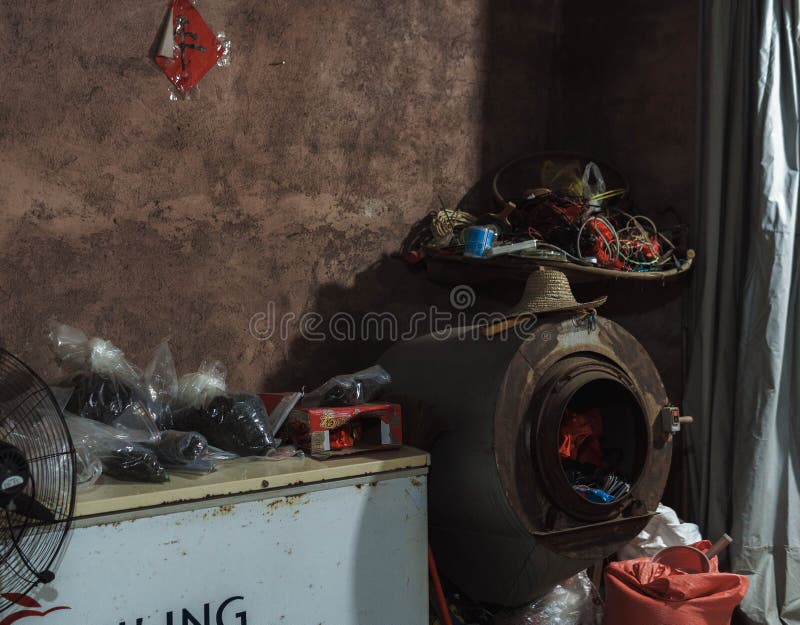 A Cluttered Workshop Filled with Various Tools, Equipment, and ...
