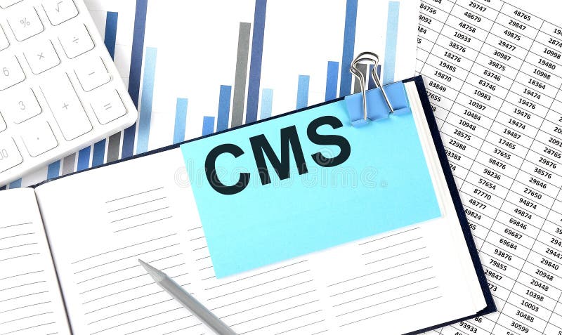 CMS Text on Blue Sticker on the Chart Background Near Calculator Stock ...