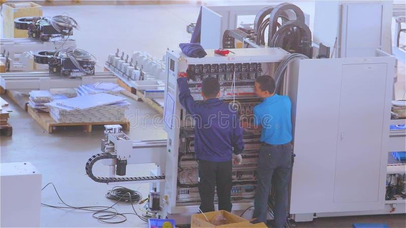 Machine Assembly Close-up. the Worker is Assembling the Machine, Close ...