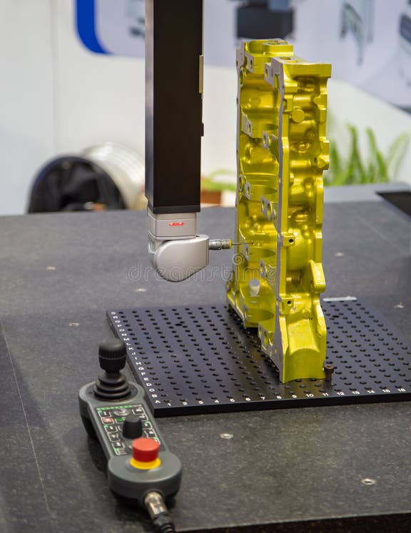 CMM inspecting engine part stock photo. Image of surface - 135307140