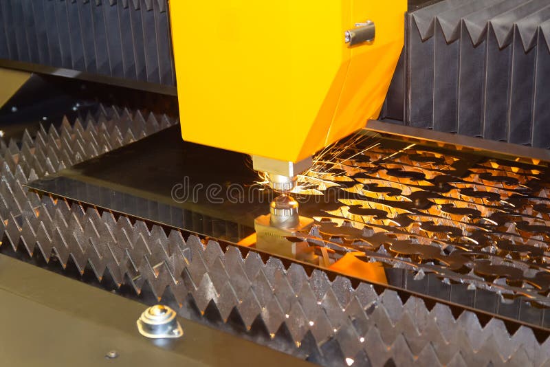 CNC Laser Cutting Machine Cutting Metal with Sparks Stock Photo - Image ...