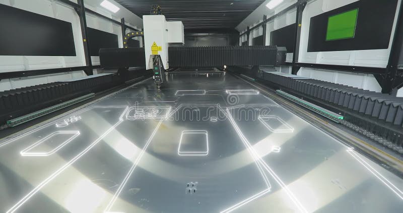 CNC Laser Cutting Machine at Work. Metal Laser Cutting Machine. CNC ...