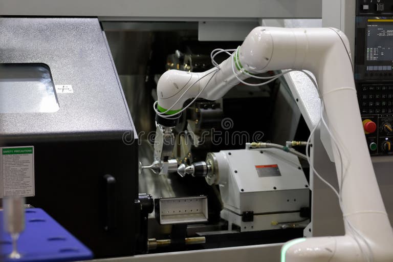 CNC Lathe Machine and Collaborative Robot Stock Photo - Image of ...