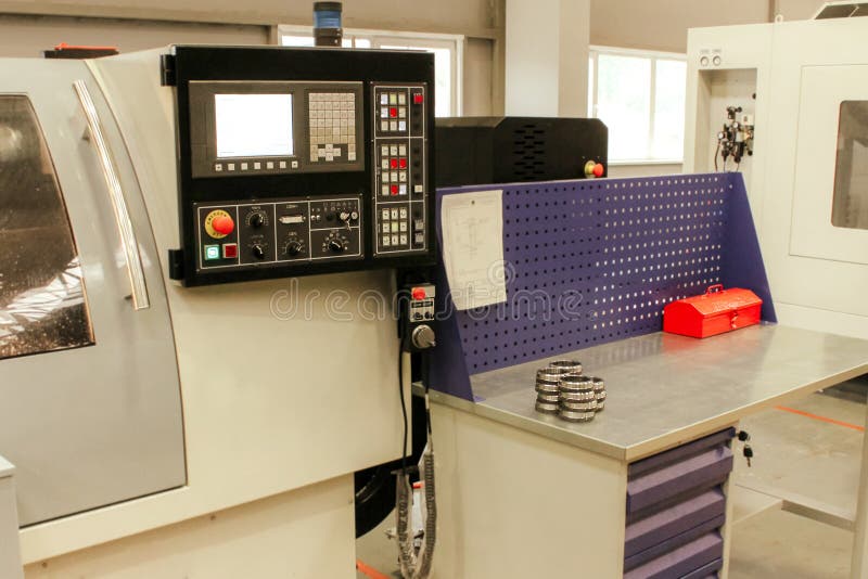 The CNC Lathe Machine. Turning Machine for Drilling with the Drill Tool ...