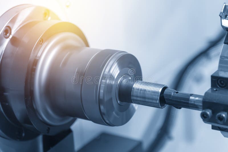 The CNC Lathe Machine or Turning Machine Cutting the Thread Stock Image ...