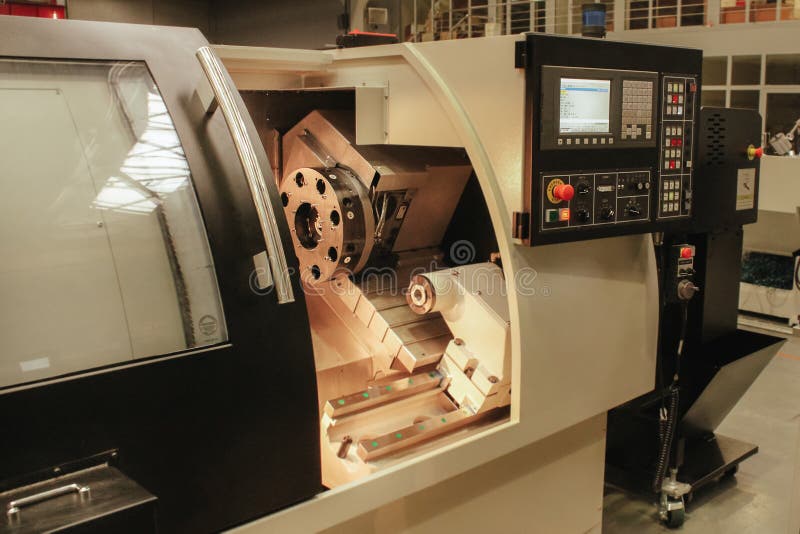 The CNC Lathe Machine. Turning Machine for Drilling with the Drill Tool ...
