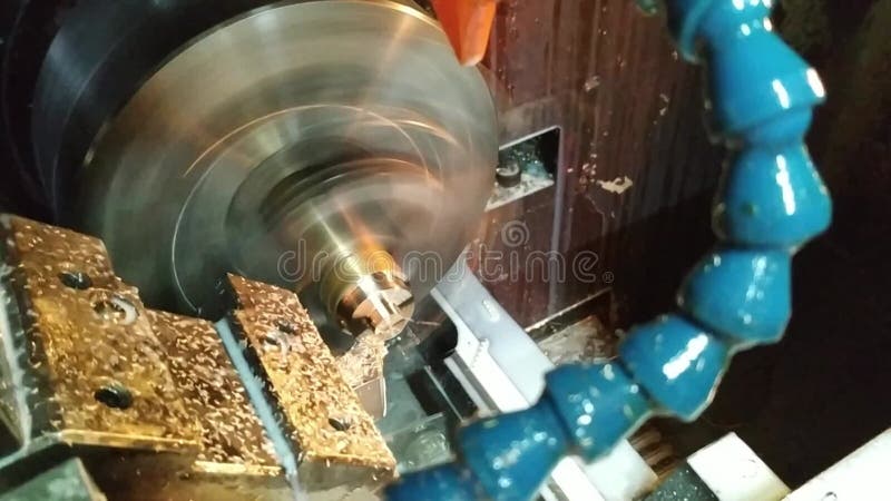 A Lathe Processes Metal Blank in the Factory. Modern Metal Cutting ...