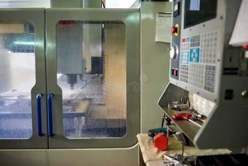 Cnc machine in action. stock image. Image of industry - 105205317