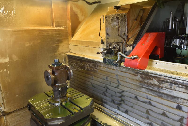 CNC Machine Automatically Changes the Nozzle for Work. the CNC Machine ...