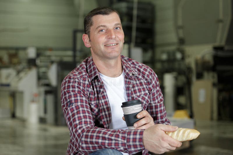 Cnc Machine Operator Having Coffee Brake in Industrial Factory Stock ...