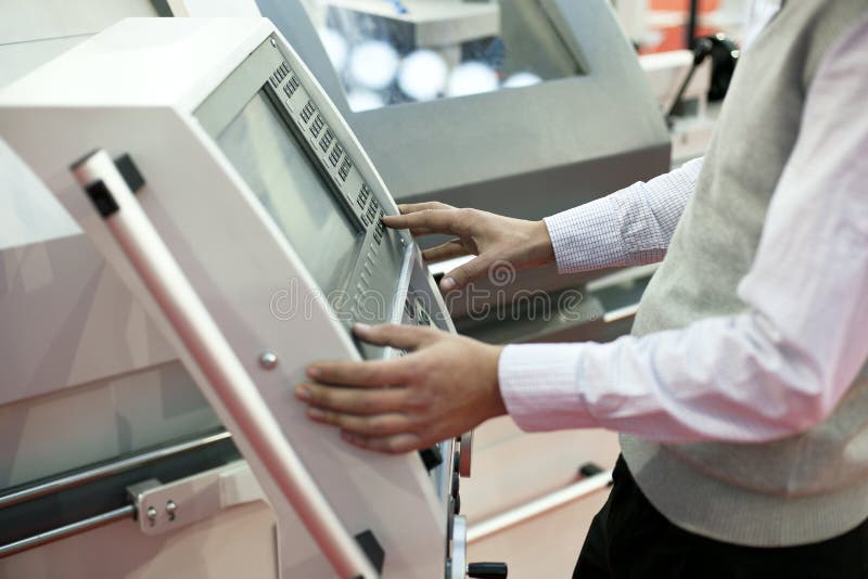 Man Working at Programmable Machine Stock Image - Image of industry ...