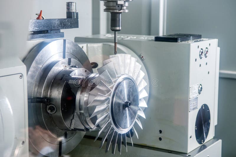 CNC Metal Cutting Machine Makes Turbine Wheel Stock Photo - Image of ...