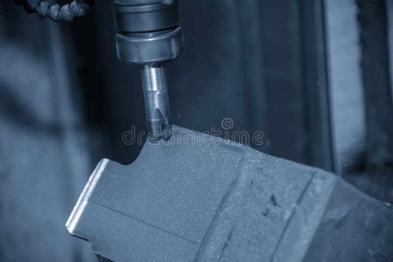 The CNC Milling Machine Cutting The Cast Iron . Stock Photo - Image of ...