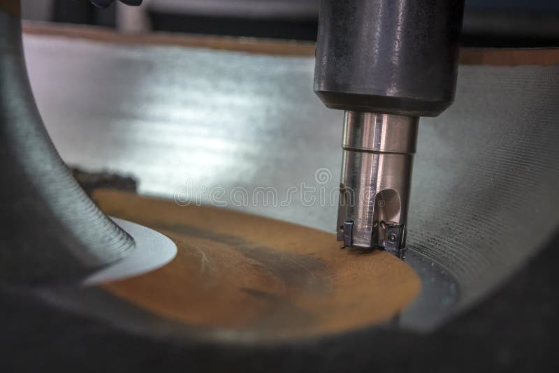 The CNC Milling Machine Cutting the Cast Iron Part. Stock Photo - Image ...