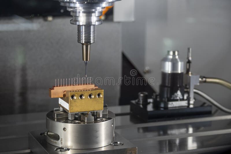 The CNC Milling Machine Cutting the Copper Electrode Parts with Solid ...