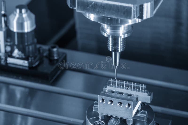 The CNC Milling Machine Cutting the Copper Electrode Parts with Solid ...