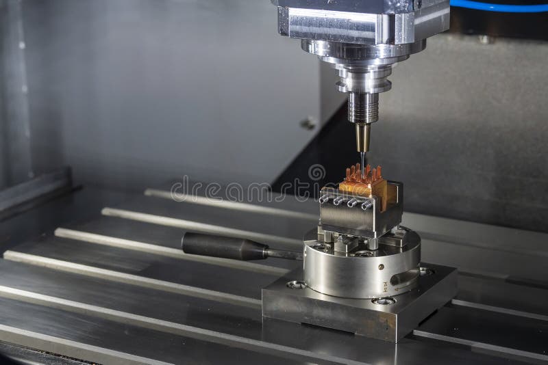 The CNC Milling Machine Cutting the Copper Electrode Parts with Solid ...