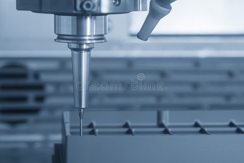 The CNC Milling Machine Cutting the Graphite Electrode Parts in the ...