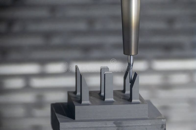 The CNC Milling Machine Cutting the Graphite Electrode Parts with Solid ...