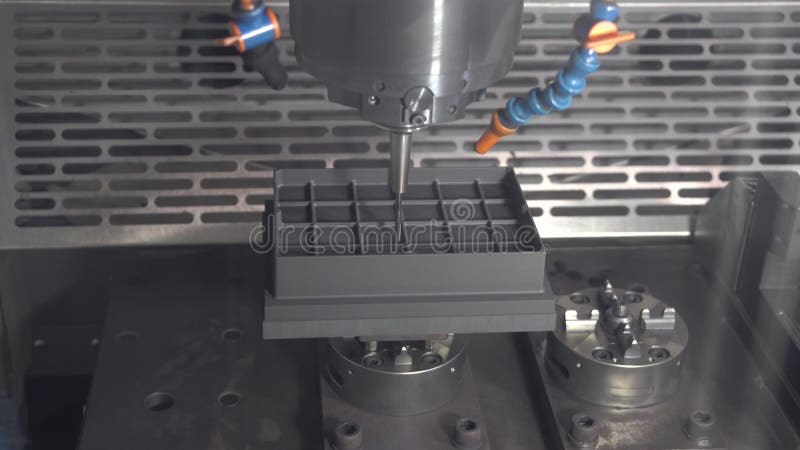 The CNC Milling Machine Cutting the Graphite Electrode Parts by Solid ...