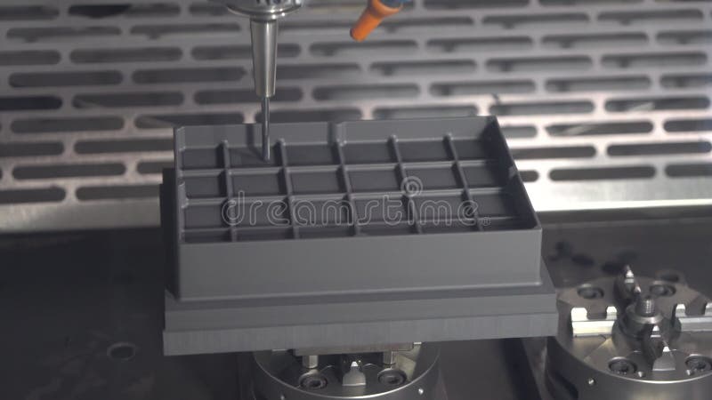 The CNC Milling Machine Cutting the Graphite Electrode Parts with Solid ...