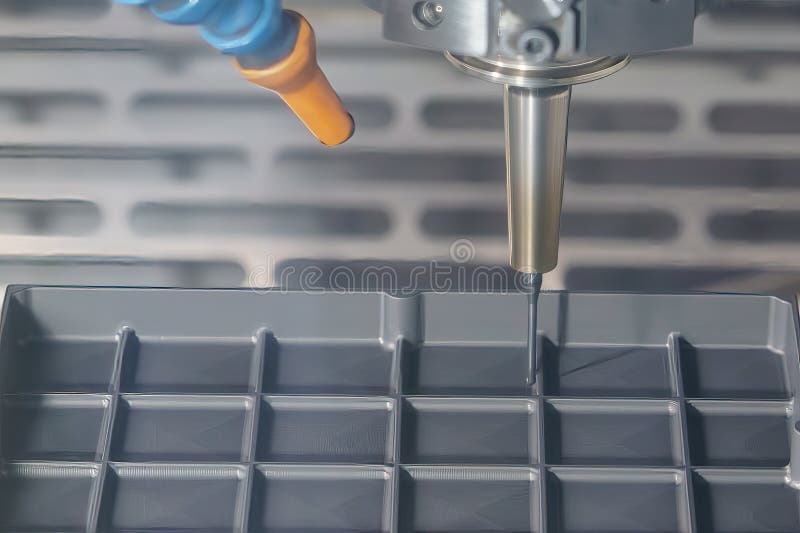 The CNC Milling Machine Cutting the Graphite Electrode Parts with Solid ...