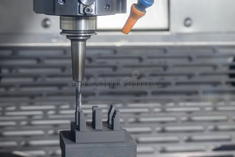 The CNC Milling Machine Cutting the Graphite Electrode Parts with Solid ...