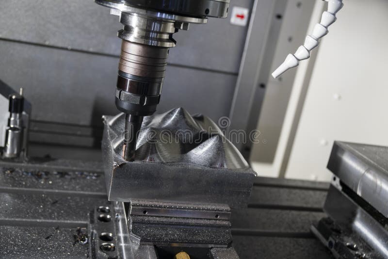 The CNC Milling Machine Cutting the Mold Part in Roughing Stock Photo ...