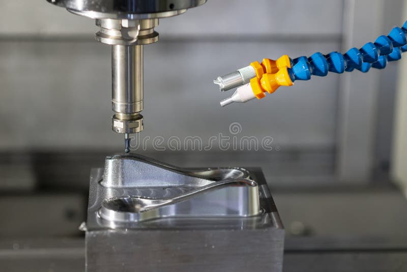 The CNC Milling Machine Cutting the Mould Part with the Solid Ball End ...