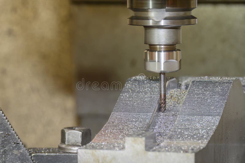 The CNC Milling Machine Cutting Press Die Part by Solid Bull End Mill ...