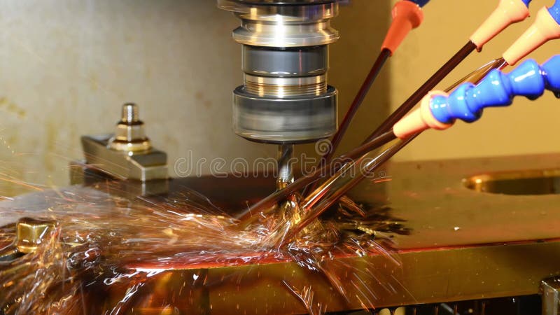 The Drilling Cycle on CNC Milling Machine with Oil Coolant Method Stock ...