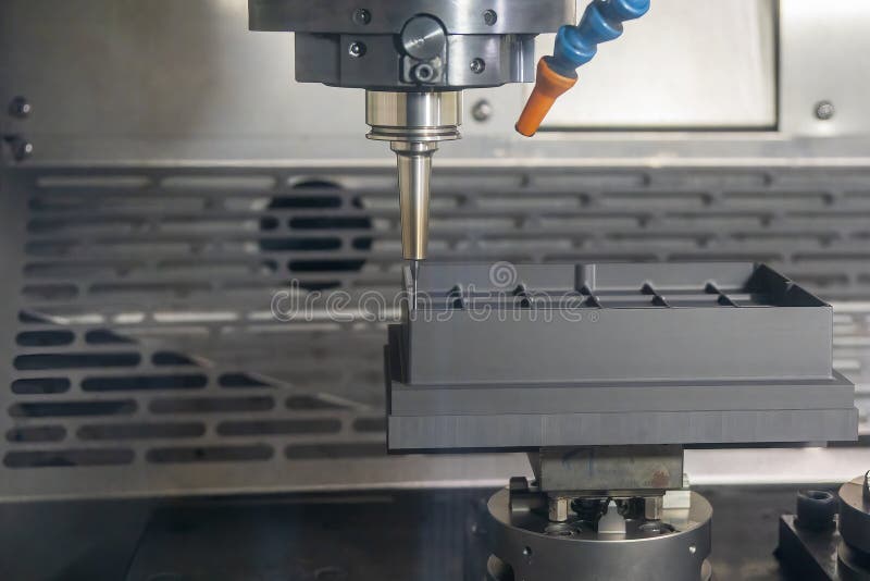 The CNC Milling Machine Finish Cutting the Graphite Electrode Parts ...