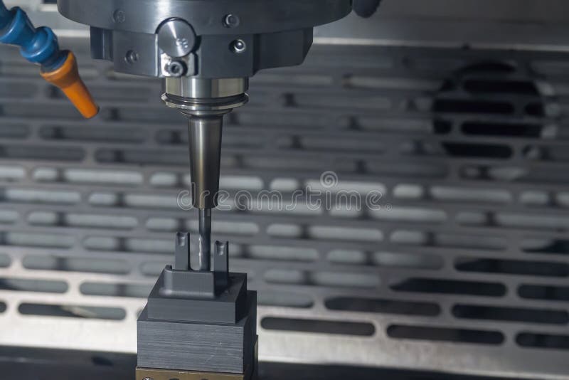 The CNC Milling Machine Finish Cutting the Graphite Electrode Parts ...