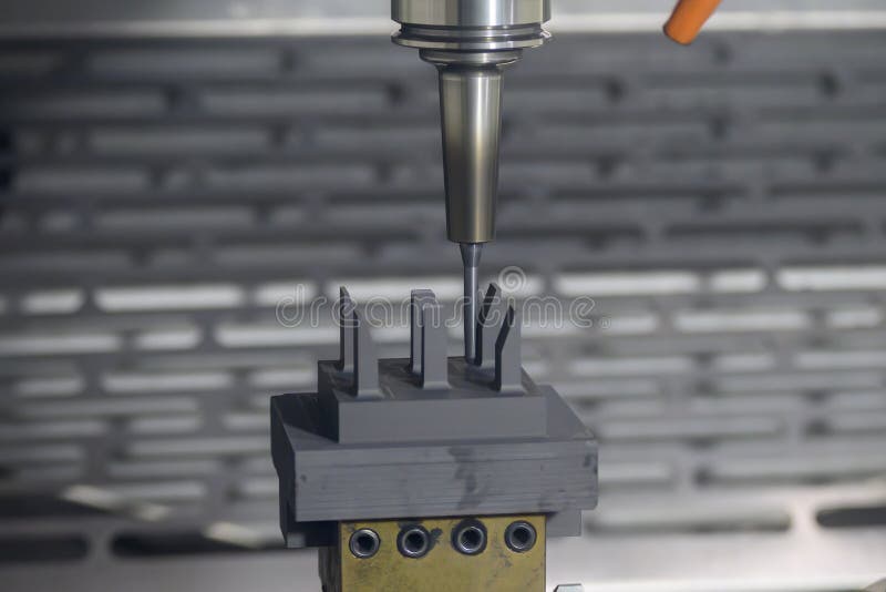 The CNC Milling Machine Finish Cutting the Graphite Electrode Parts ...