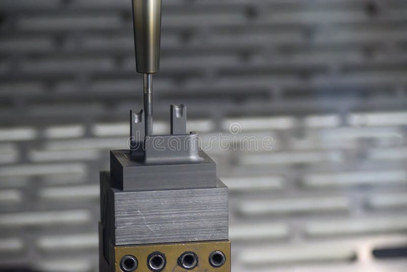 The CNC Milling Machine Finish Cutting the Graphite Electrode Parts ...