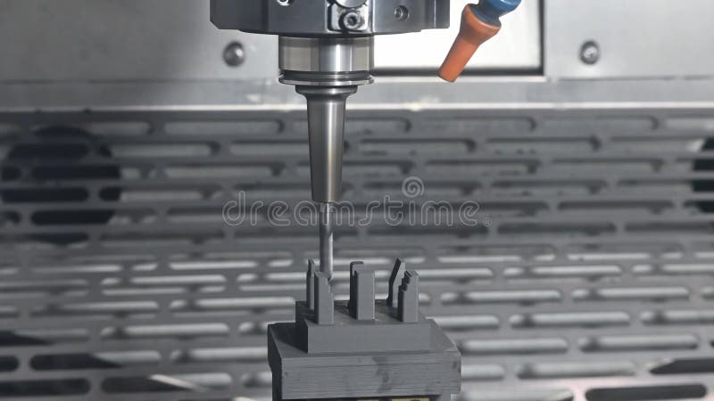 The CNC Milling Machine Finish Cutting the Graphite Electrode Parts ...