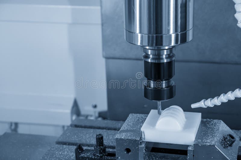 The CNC Milling Machine Finishing Cut the Plastic Parts with the Solid ...