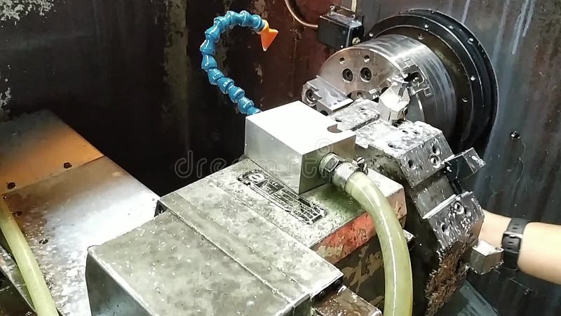 CNC Milling Machine in the Process of Processing a Workpiece in Three ...