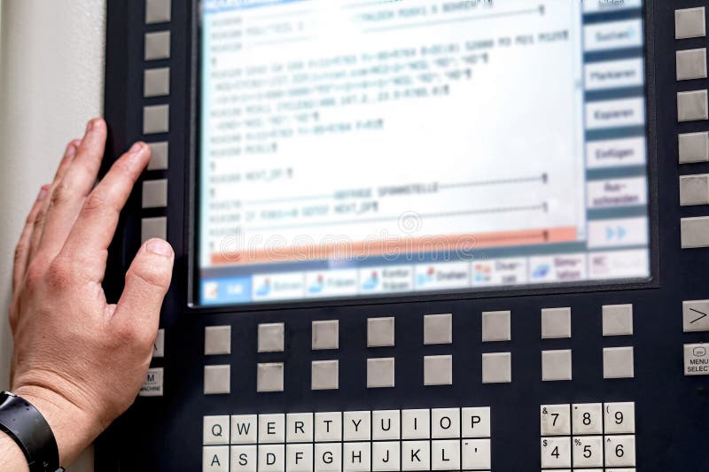 The Operator of the CNC Milling Machine Writes the Program and Makes ...