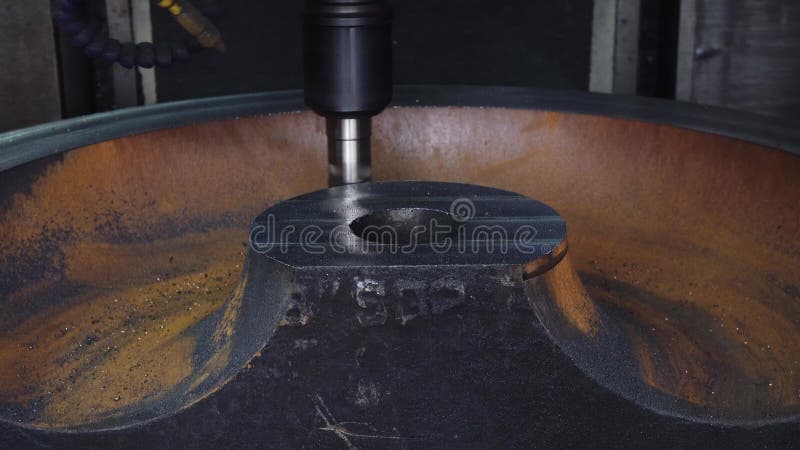 The CNC Milling Machine Rough Cutting the Cast Iron Material Parts by ...