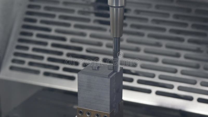 The CNC Milling Machine Rough Cutting the Graphite Electrode Parts by ...