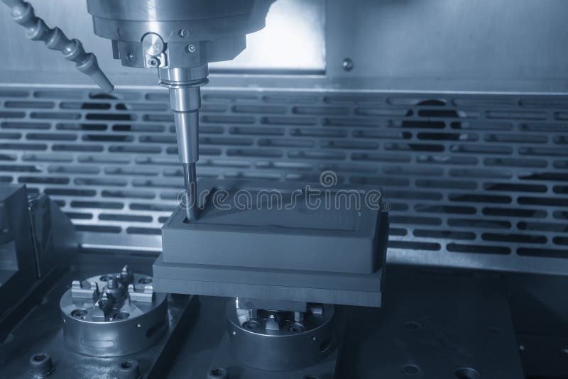 The CNC Milling Machine Rough Cutting the Graphite Electrode Parts with ...