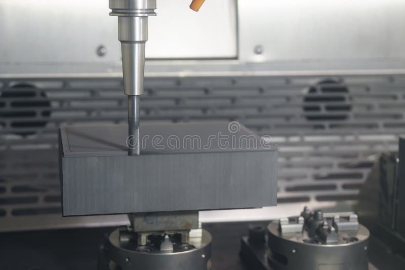 The CNC Milling Machine Rough Cutting the Graphite Electrode Parts with ...