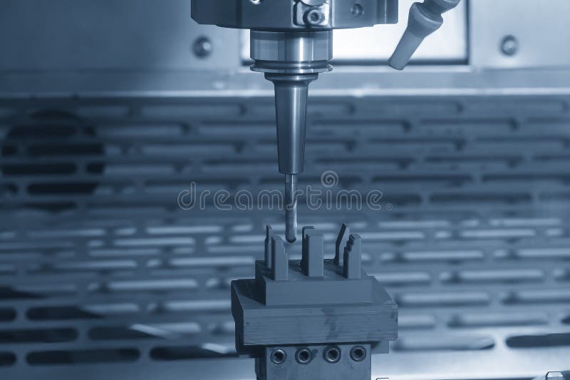 The CNC Milling Machine Rough Cutting the Graphite Electrode Parts with ...